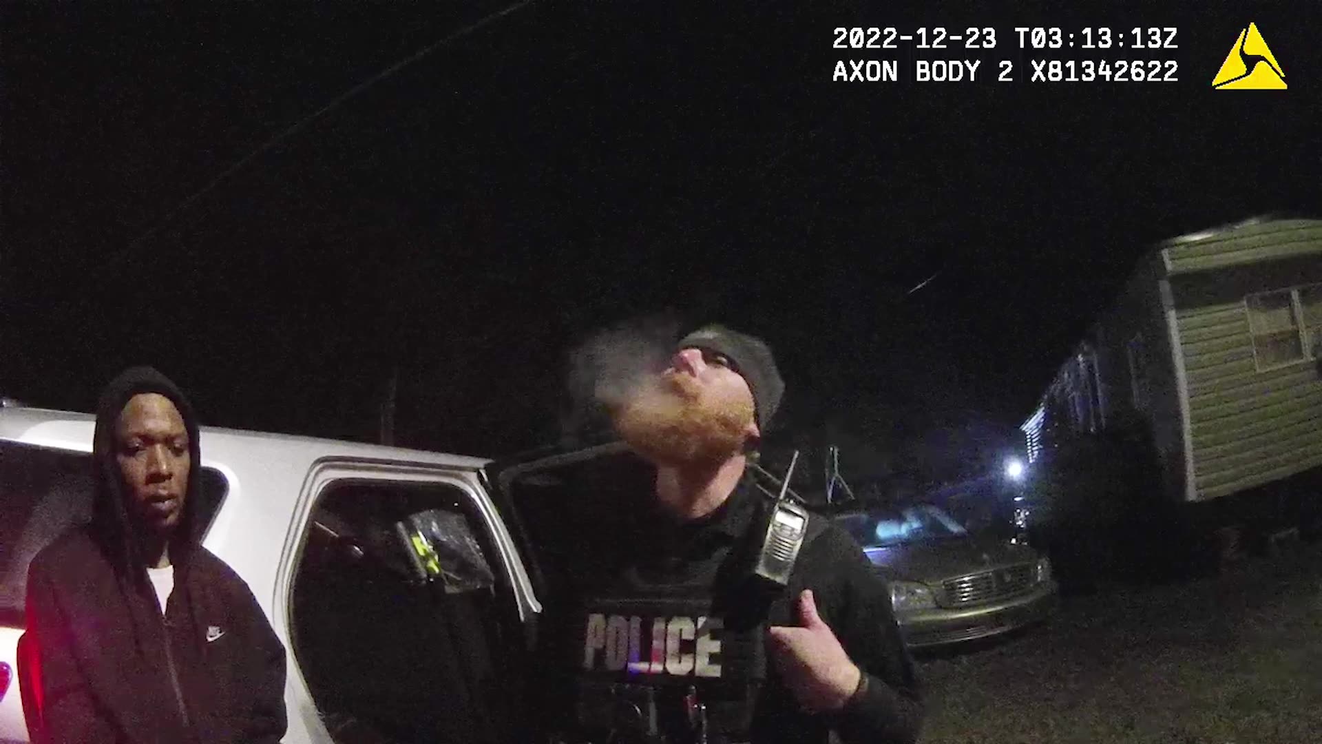 Cop smoking on the job