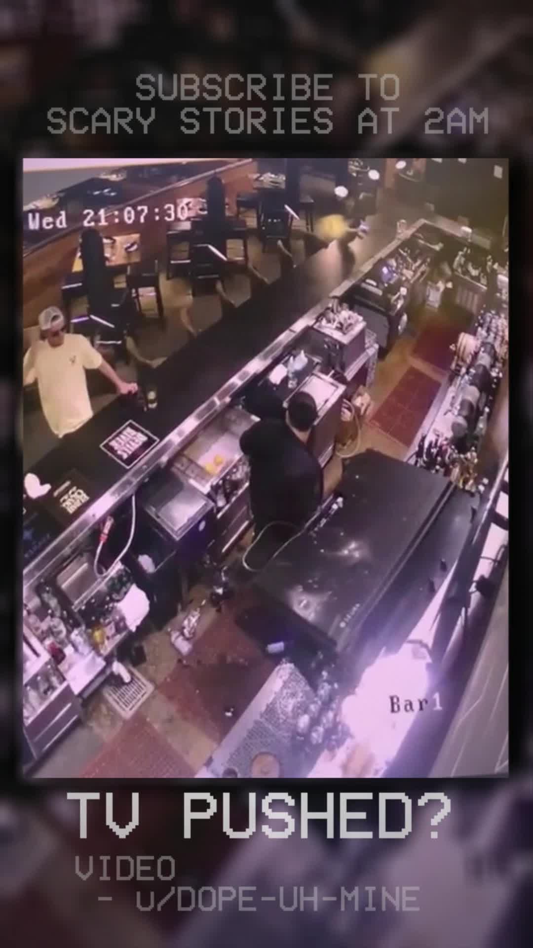 terrifying CCTV of television falling on bartender.. what happened? #shorts