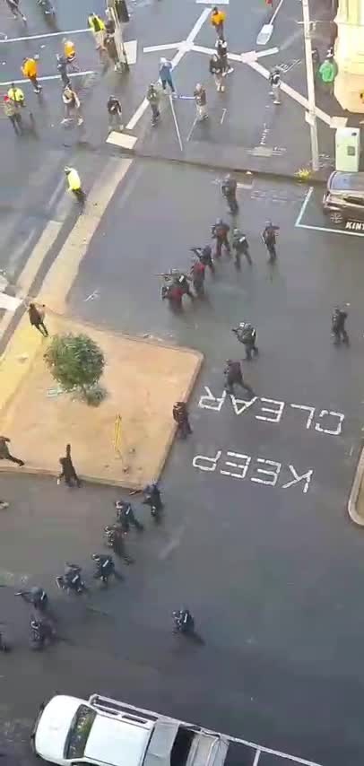 Aerial View Of Riot Police Shooting Rubber Bullets At Construction ...