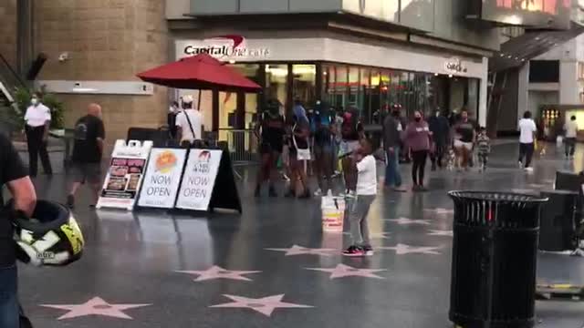 Young Boy Rapping in Downtown Hollywood