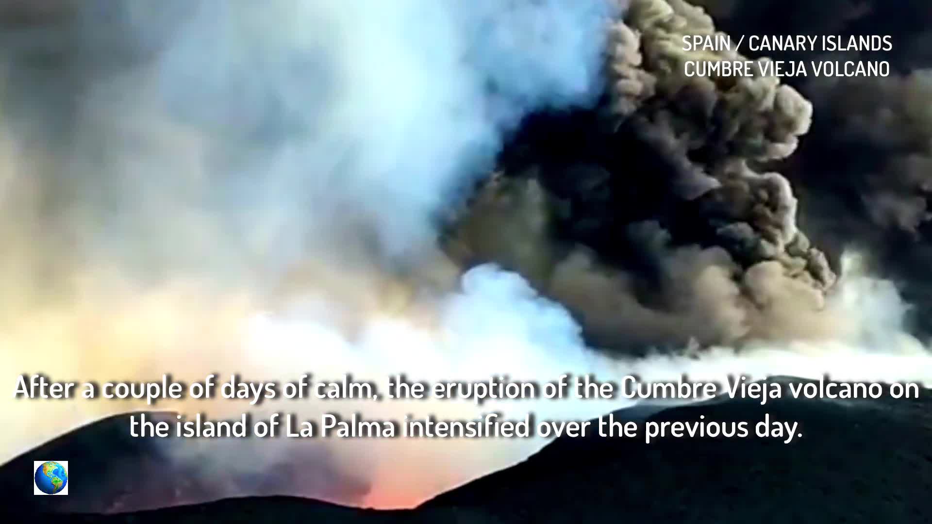 Lightning strikes from the sky directly into the crater of the volcano ...