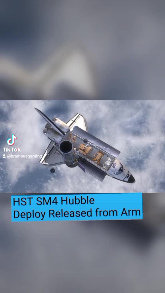 Space Shuttle Deploy Releases HST SM4 Hubble from Arm