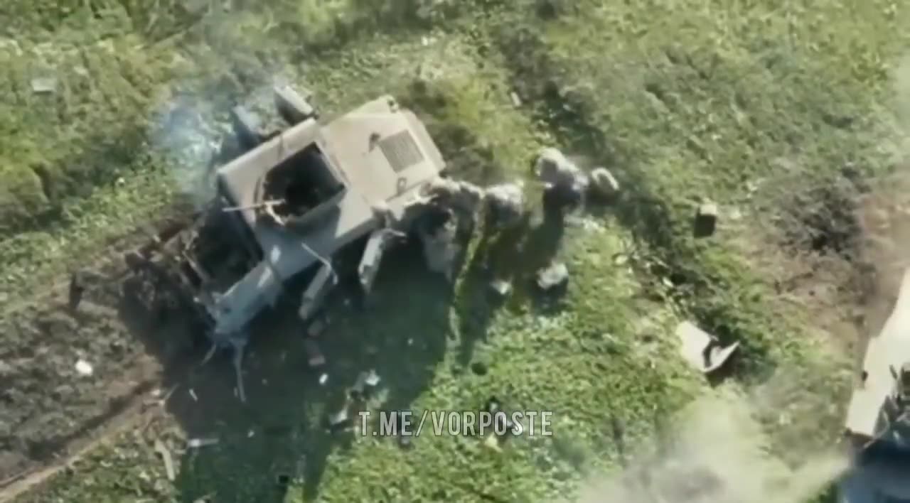 An American Humvee hits a mine, with a Russian drone watching intently ...