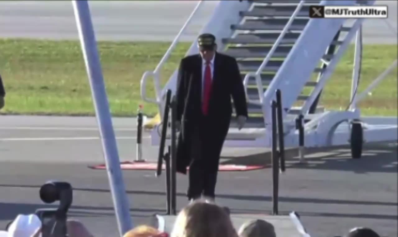 Trump walks off plane to the Undertaker like a total badass